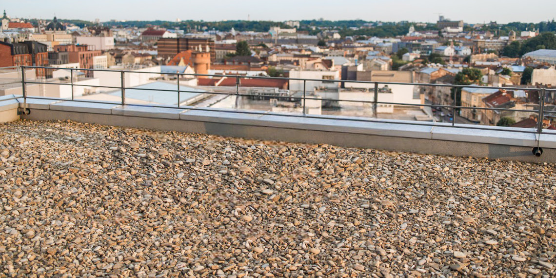 What Are Gravel and Stone Ballasts For on Commercial Roofs?